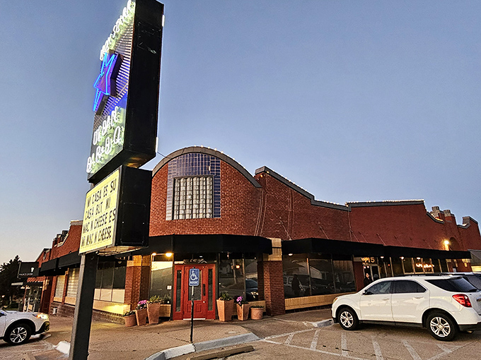 The curved roof and red door say "we're fancy," but the smoky aroma says "we're serious about our brisket."