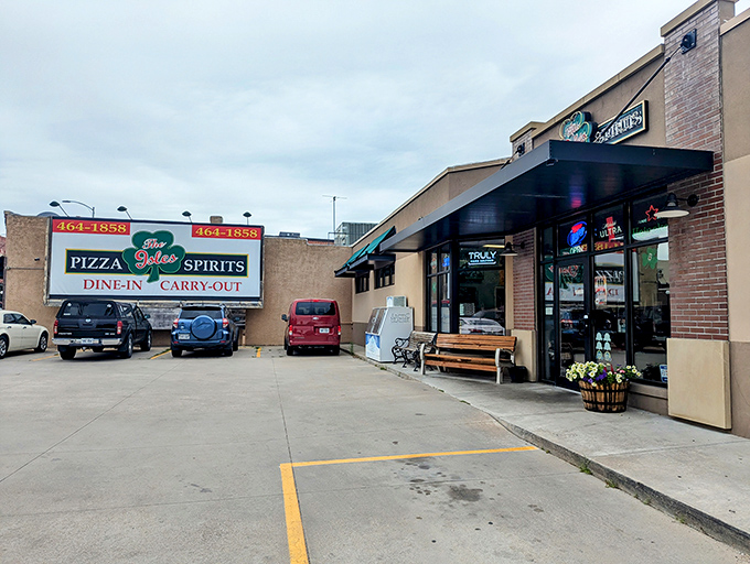 Isles Pub & Pizza (interior): "No-nonsense tables, no-frills chairs, all-business pizza. Sometimes the plainest rooms hold the richest experiences."