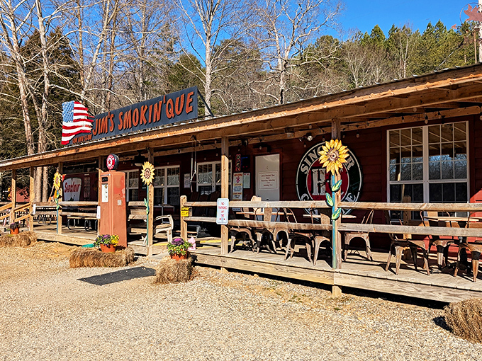 Rustic porch, hay bales, and sunflowers—Jim's Smokin' Que looks like a country song that tastes like smoked perfection.