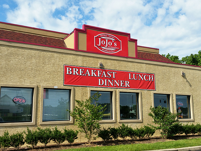 The bold red signage of JoJo's Super Dogs announces its mission with refreshing clarity: breakfast, lunch, and dinner done right.
