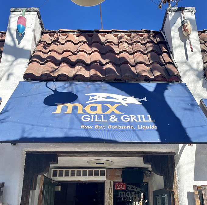 The sun-drenched sign at Max promises three essential food groups: seafood, rotisserie, and cocktails&mdash;the holy trinity of dining.