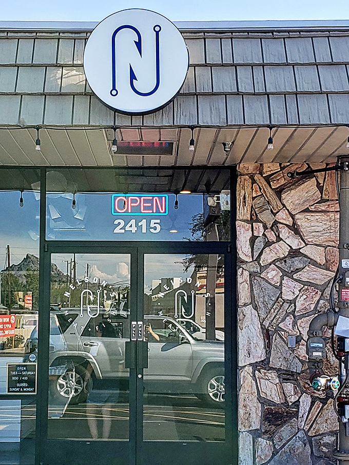 That simple circular logo marks the spot where seafood purists gather to worship at the altar of freshness and simplicity.