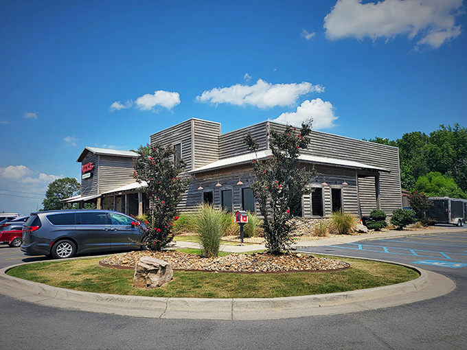 Nick's Bar-B-Q stands proudly under blue Arkansas skies, a temple of smoke where barbecue pilgrims find salvation.