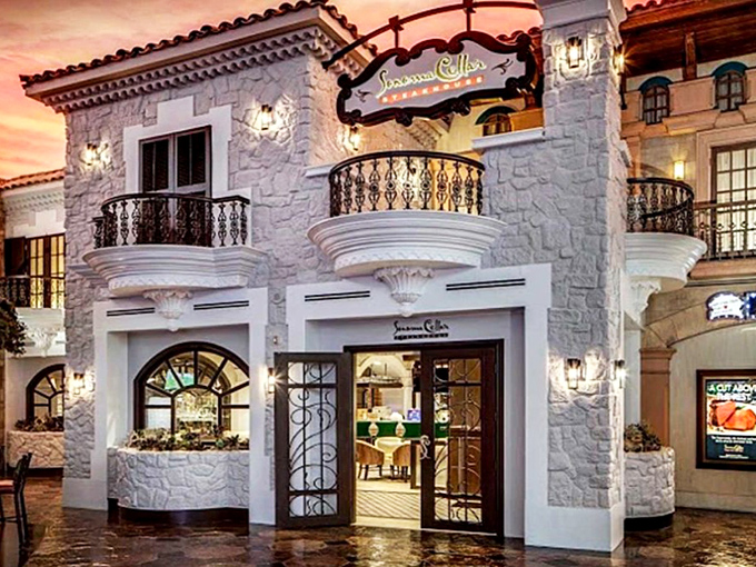 That sunset glow on Sonoma Cellar's white stone fa&ccedil;ade is nature's way of saying, "Something magical awaits inside."