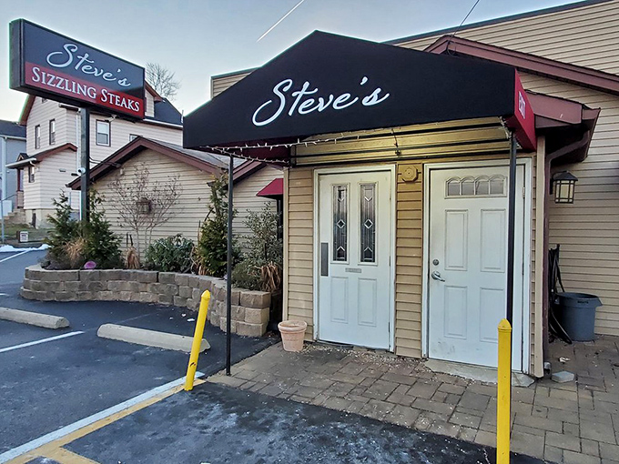 The humble entrance to Steve's hides culinary treasures that would make pirates abandon their gold for a reservation.