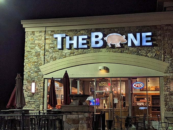 At night, The Bone's illuminated pig sign serves as a beacon for the hungry. Stone walls and good meat &ndash; some combinations are simply timeless.