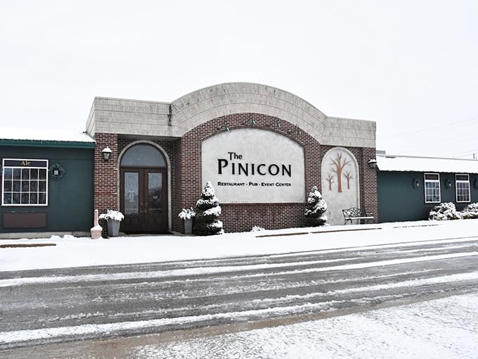 Winter or summer, The Pinicon's entrance promises the same heartwarming story: exceptional steaks in an unpretentious setting.
