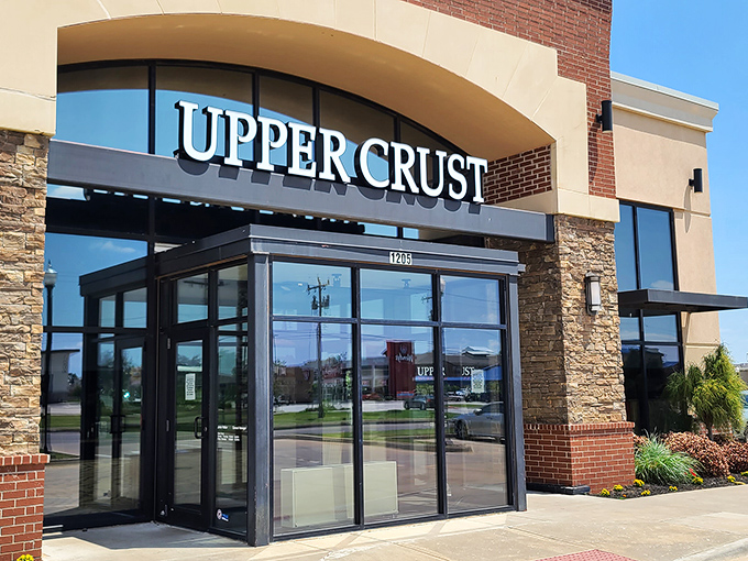 That wood-fired oven isn't just for show &ndash; it's the secret weapon in Upper Crust's flavor arsenal. Prepare for pizza enlightenment!