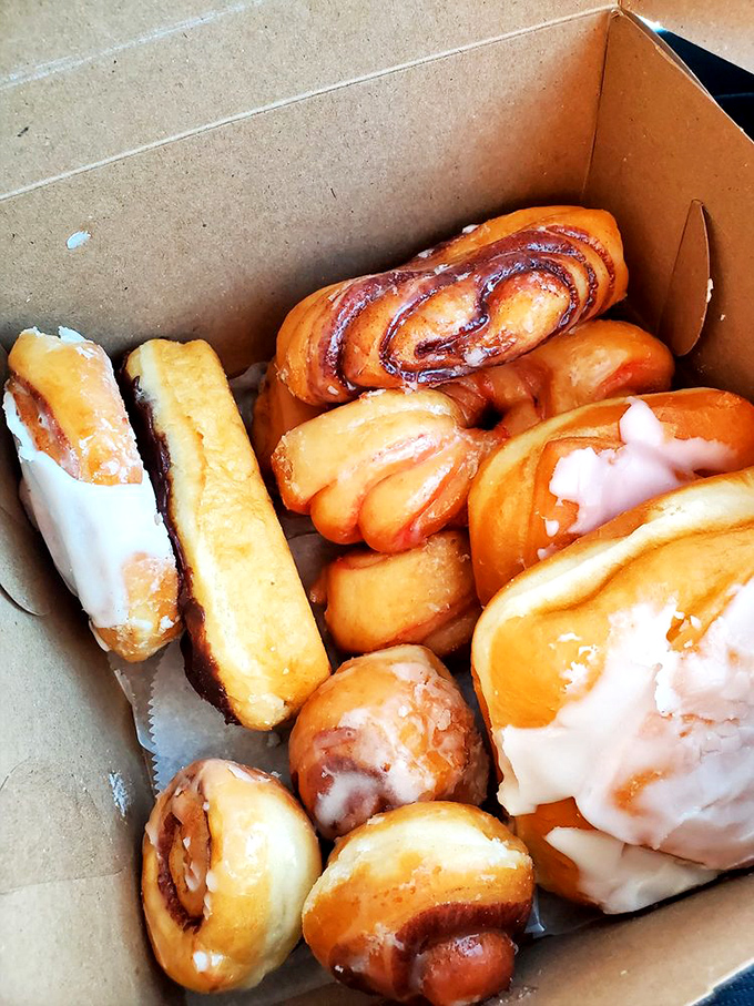 The holy grail of breakfast indulgence – a mixed dozen that covers all your emotional needs, from "slightly peckish" to "existential crisis."