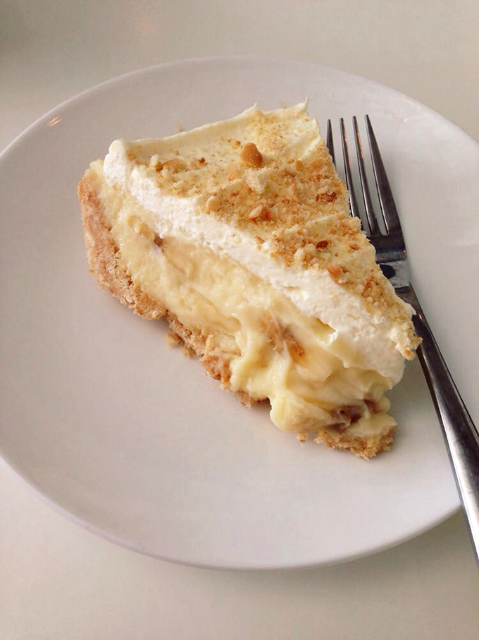 Banana cream pie so perfect it belongs in a museum. The graham cracker crust provides the ideal foundation for this architectural masterpiece.