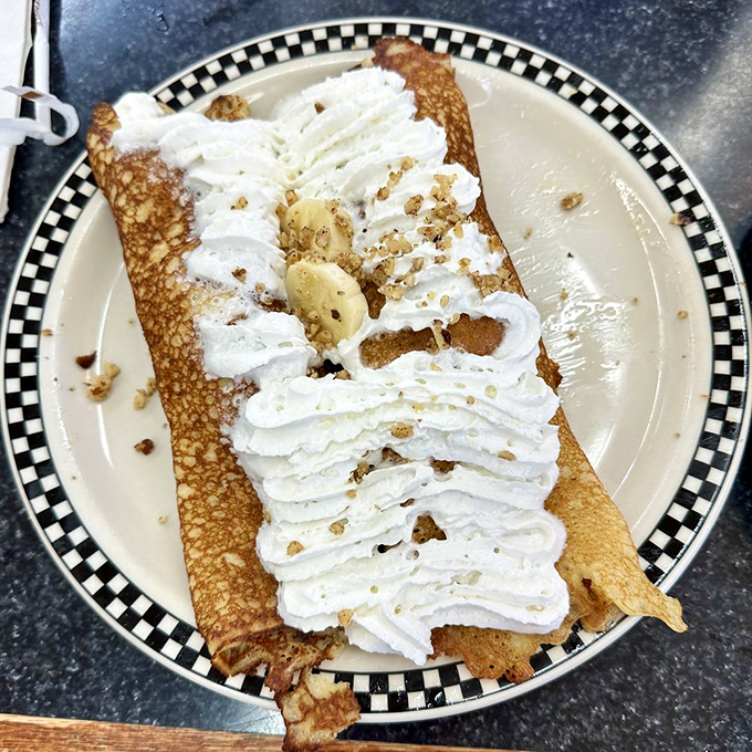 Classic breakfast perfection: golden eggs, crispy bacon, and home fries that somehow manage to be both crispy and tender. The breakfast trifecta!