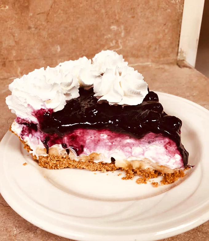 This blueberry cream pie doesn't just have layers, it tells a story&mdash;graham cracker foundation, creamy middle, and that perfect berry finale.