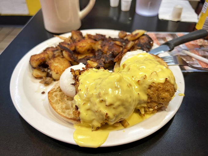 Hollandaise cascading like Niagara Falls over crab cakes Benedict. Maryland's answer to "How do we make breakfast even more Maryland?"