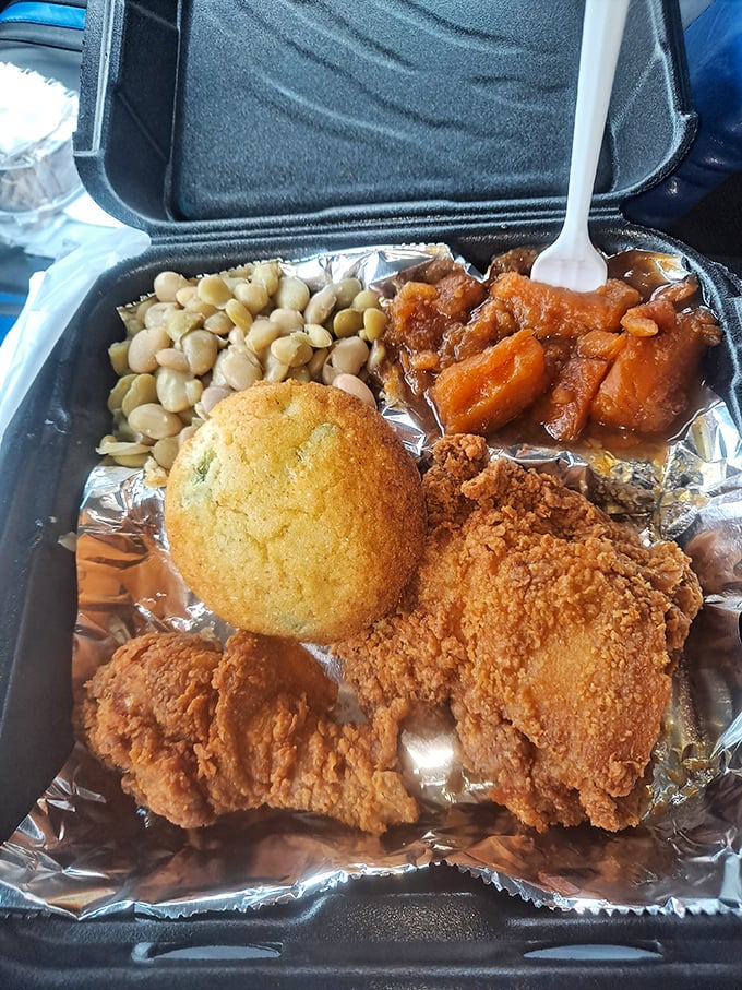 Road trip perfection in a to-go box&mdash;black-eyed peas, candied yams, cornbread, and fried chicken that makes fast food chains weep with inadequacy.