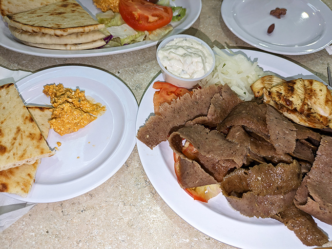 Gyro meat sliced thin enough to read the newspaper through, piled high with all the fixings&mdash;proof that sometimes more is exactly right.