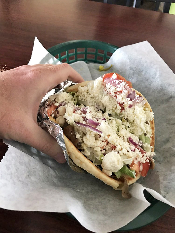 Handheld happiness with a perfect ratio of meat to veggies to sauce. Some architects design buildings; these folks design the perfect bite.