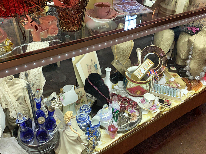 A miniature museum behind glass. These delicate treasures represent generations of special occasions, graduations, and promises made.