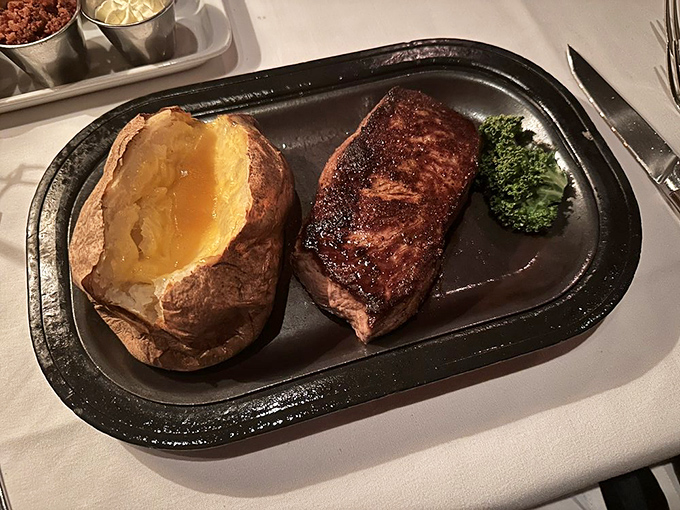 A baked potato that could make Idaho weep with pride alongside a steak with the kind of char that makes meat lovers weak at the knees.