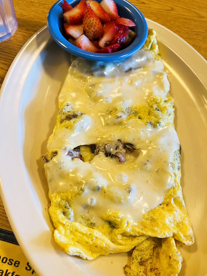 Eggs, cheese, and fresh strawberries &ndash; breakfast's perfect trinity. Whoever said you can't have your fruit and eat your omelet too?