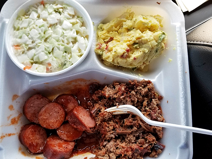 Behold the star of the show&mdash;pulled pork with those coveted charred bits mixed in. This isn't food; it's edible artwork.