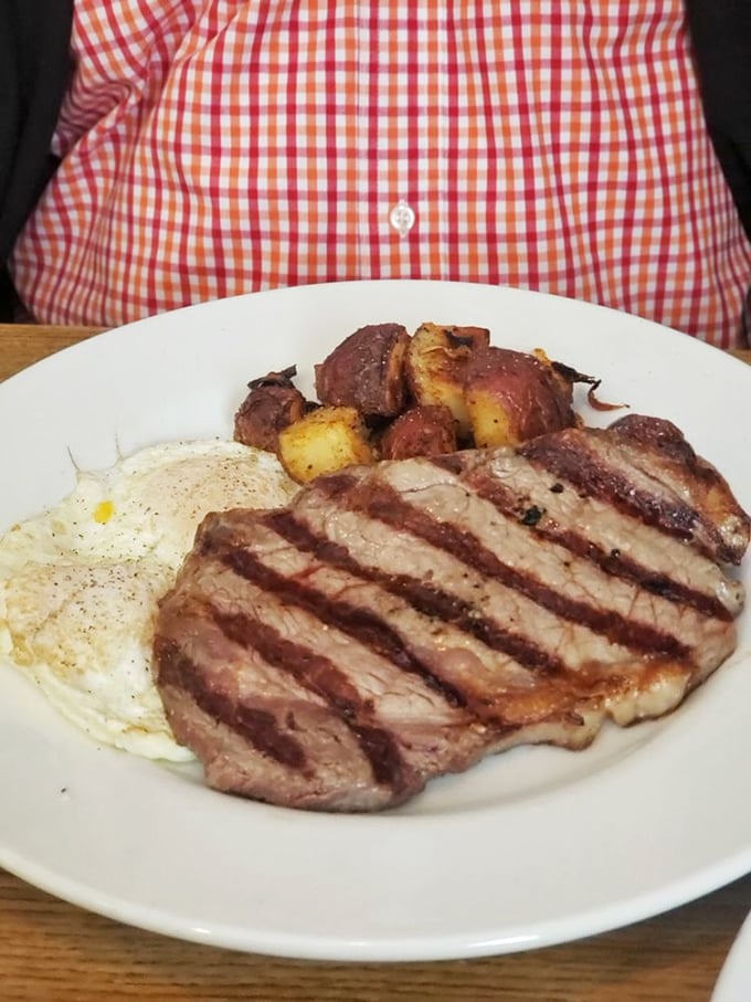 Breakfast of champions: a juicy steak with eggs and home fries. Not all heroes wear capes&mdash;some wear aprons and know exactly how to cook meat.