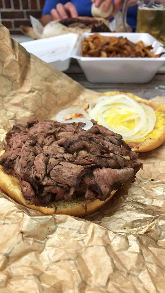 That glorious moment when beef meets onion on a sandwich that doesn't need Instagram filters to look magnificent. This is real-life food porn.