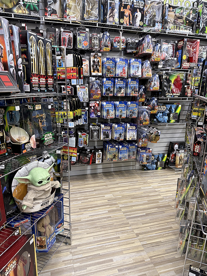 Star Wars heaven! This booth is where grown men suddenly remember their childhood Christmas lists with startling clarity. The Force of nostalgia is strong here.