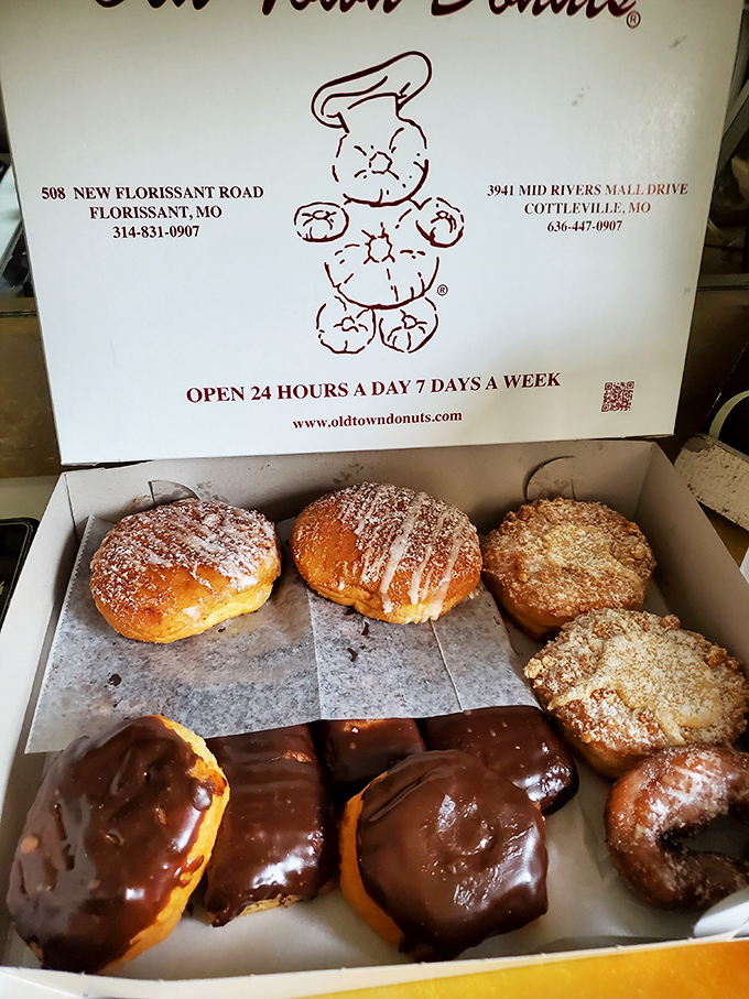 Maple-bacon long johns living harmoniously with cake donuts and glazed classics. It's like a United Nations of breakfast indulgence.