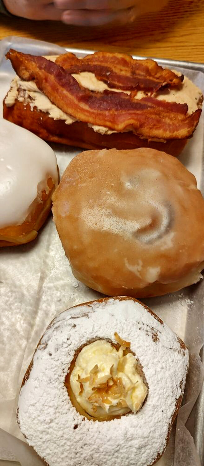 The maple bacon long john &ndash; where breakfast meets dessert in an unholy alliance that somehow makes perfect sense to your taste buds.