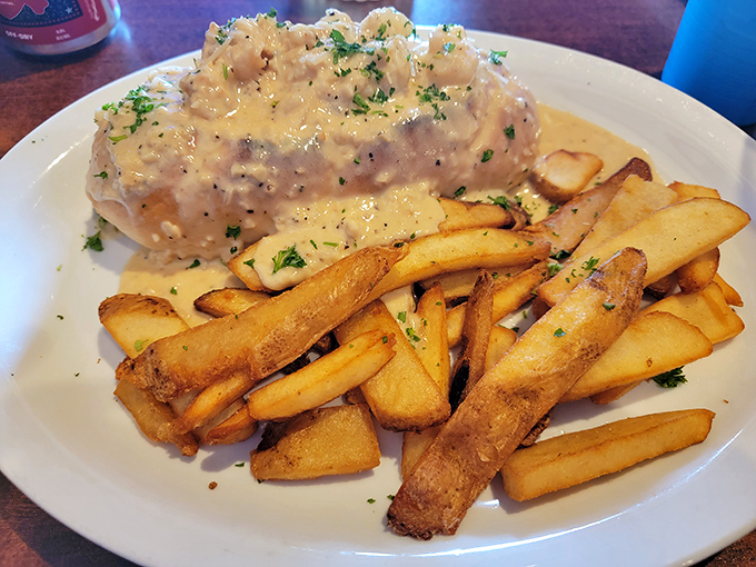 Decadence has a new address. Creamy alfredo sauce blankets this lobster roll like a luxurious fog rolling over a New England harbor.