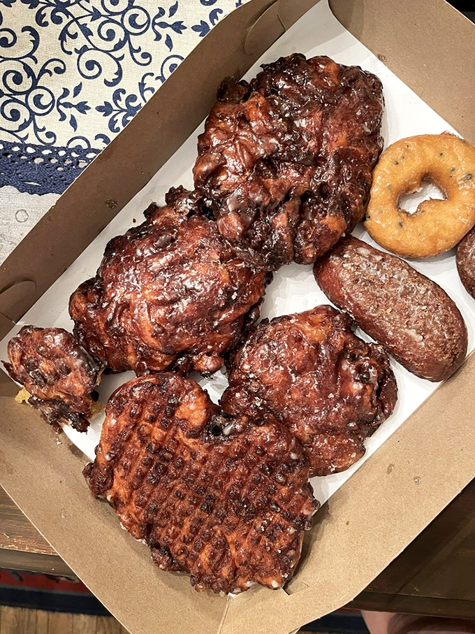These apple fritters are architectural marvels of fried dough&mdash;craggy mountains of apple-cinnamon goodness with crispy edges that shatter like caramelized glass.