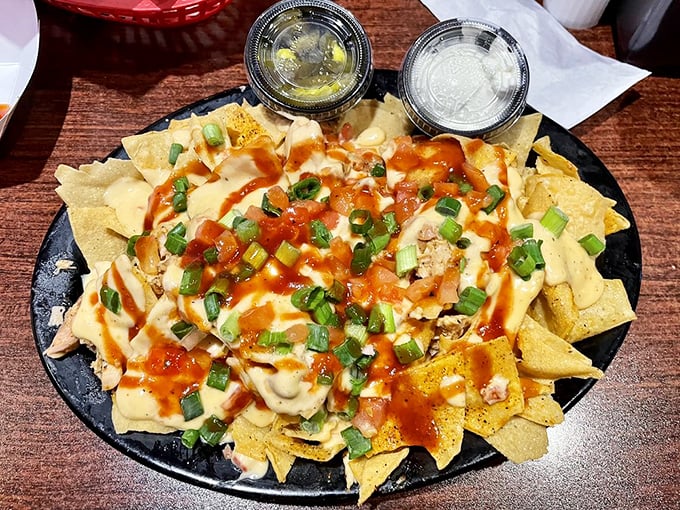 BBQ nachos that bridge Tex-Mex and smokehouse traditions&mdash;where tortilla chips become vessels for cheese, chicken, and BBQ salvation.