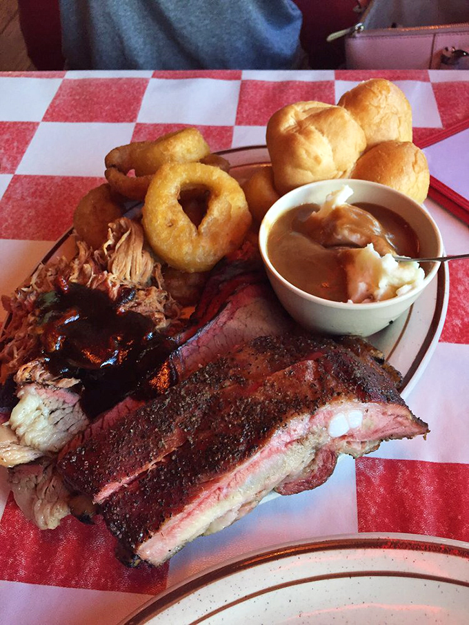 A barbecue plate that answers the eternal question: "Why can't I have it all?" Ribs, pulled pork, and sides that know their supporting role.