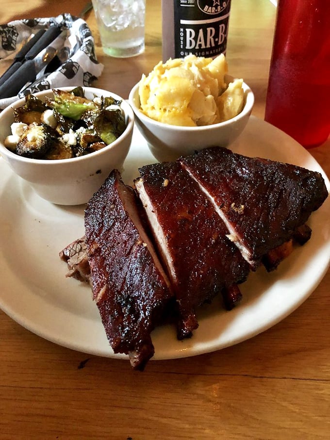 A plate that answers life's most important question: "Why choose between ribs, mac and cheese, and Brussels sprouts when you can have it all?"
