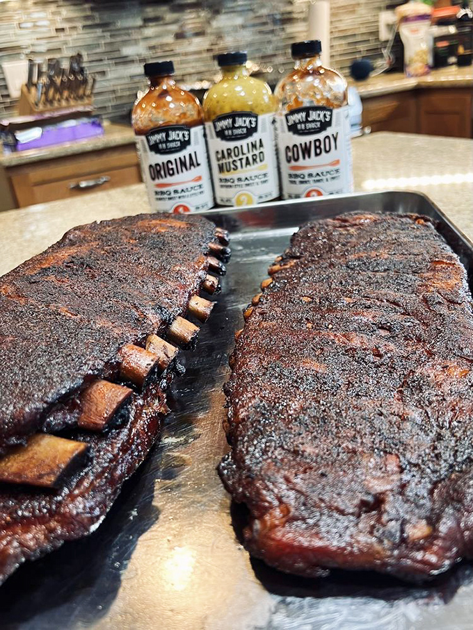 These ribs have the kind of bark that makes dogs jealous and the smoke ring that makes pitmasters proud.