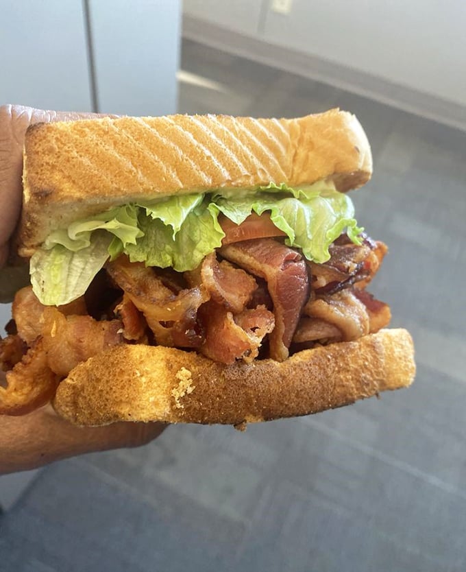 This BLT should be renamed the "BBB"&mdash;Bacon Beyond Belief. When a sandwich requires structural engineering to contain its contents, you know you're somewhere special.