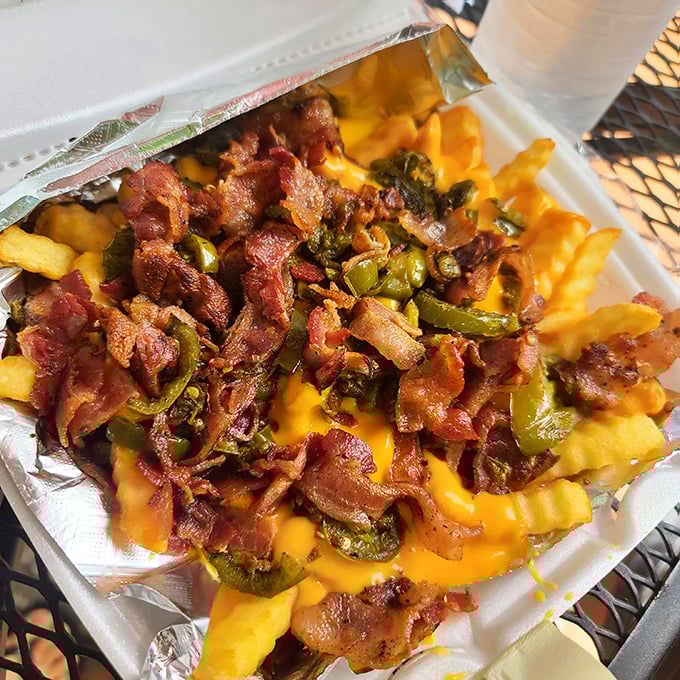These aren't just cheese fries&mdash;they're a commitment. Bacon and jalape&ntilde;os transform a side dish into the main event that demands your full attention.