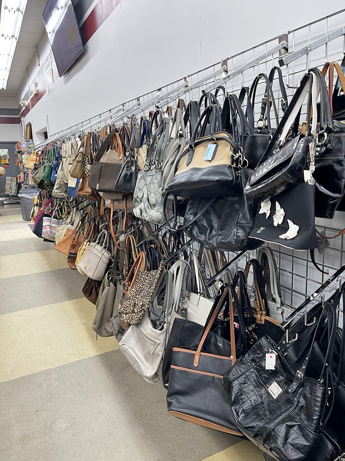 Handbag heaven! Designer lookalikes mingle with genuine vintage finds in this leather and fabric forest of functional fashion statements.