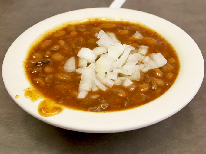 Their famous bean soup, topped with diced onions, has a spice blend more closely guarded than the formula for Coca-Cola or Colonel Sanders' secret recipe.