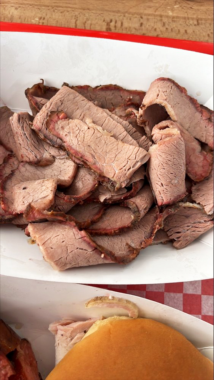 Brisket sliced thicker than a good novel, with edges kissed by smoke. This isn't just meat&mdash;it's a time capsule of patience and wood-fired perfection.