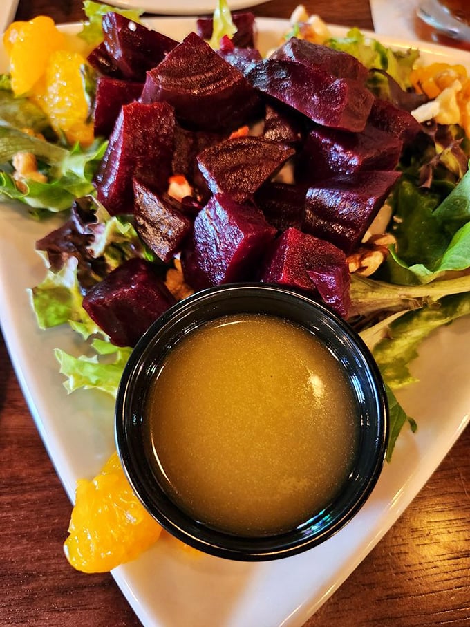 Jewel-toned beets arranged like rubies on a bed of greens&mdash;proof that salads can be both virtuous and exciting.