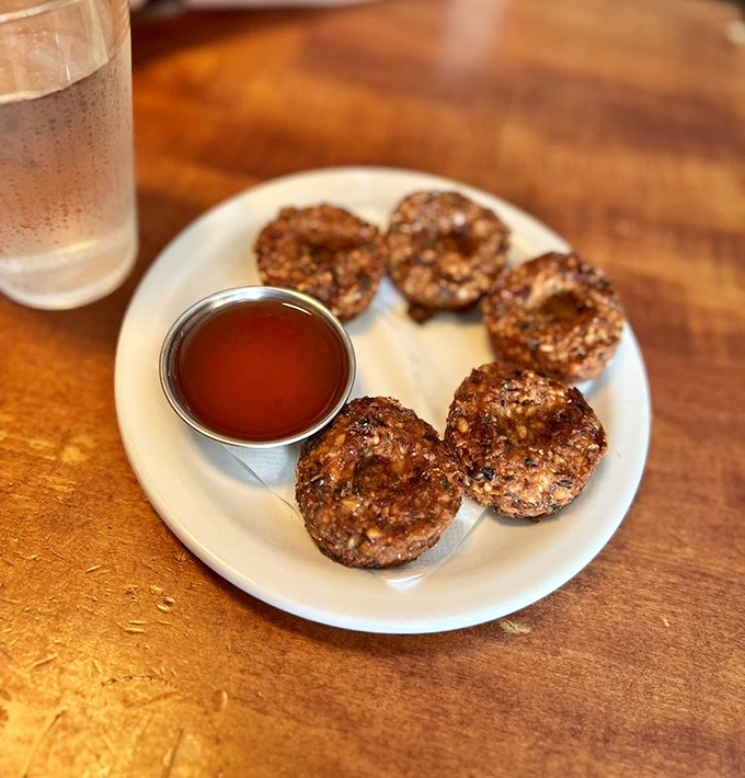 Black-eyed pea fritters: proof that Southern ingenuity can turn humble ingredients into crispy, addictive bites of pure joy.