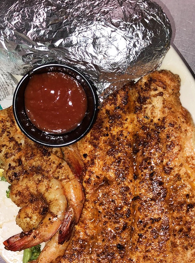 Blackened seasoning creates a flavor explosion that makes this seafood duo sing like a country duet on a Saturday night.