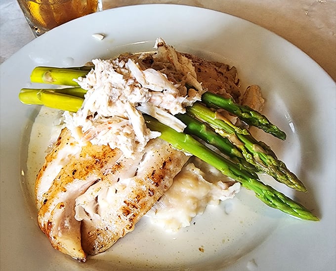 Delicate fish paired with vibrant asparagus spears&mdash;proof that simplicity, when executed perfectly, creates the most memorable meals.