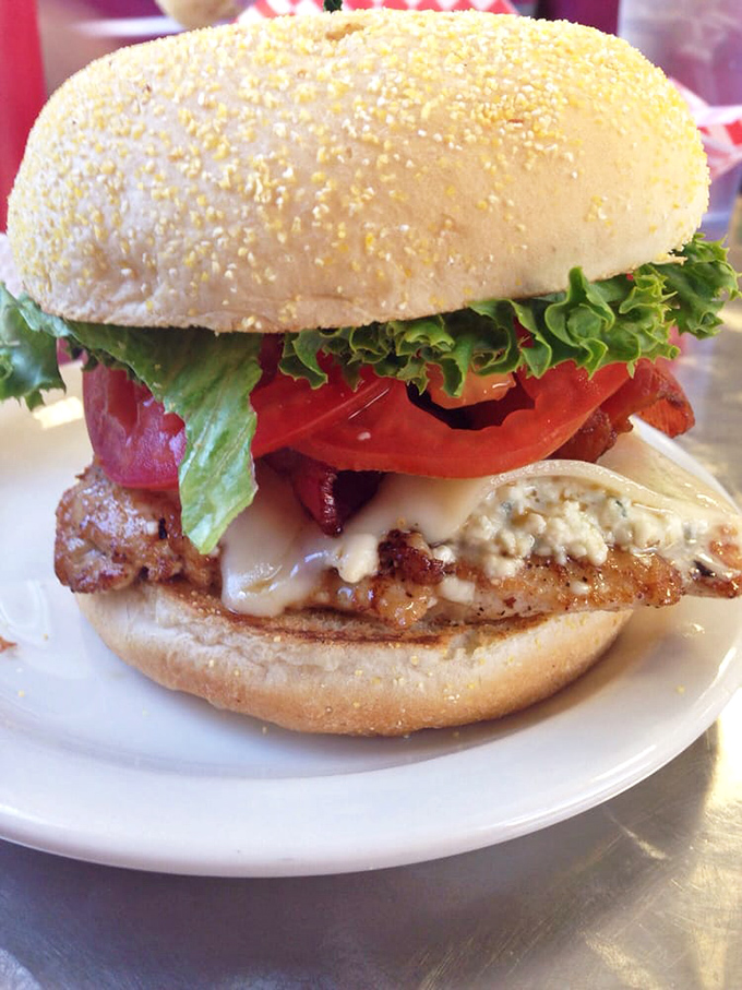 This chicken sandwich proves Big Jud's isn't just a one-trick pony&mdash;the melted cheese cascades like a dairy waterfall over crispy perfection.