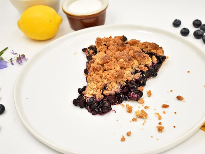 Blueberry filling so vibrant it could stain your soul purple, crowned with a crumb topping that defines textural perfection.