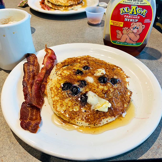 Blueberry pancakes that would make your grandmother both proud and jealous. The bacon alongside is just showing off.