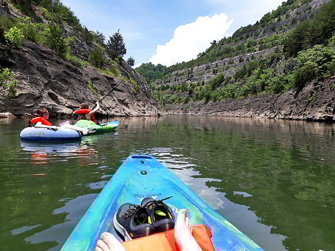 Water adventures await in the stunning gorges near Pikeville, where kayaking feels like floating through nature's own cathedral.