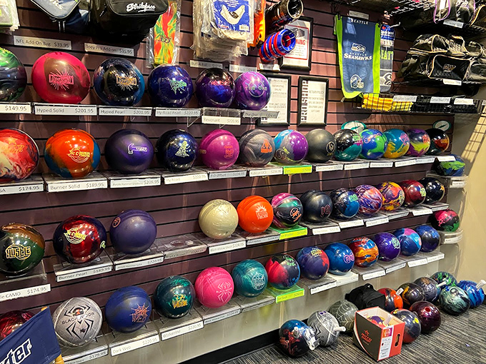 Bowling balls lined up like exotic fruits at a market&mdash;each one promising different curves, speeds, and excuses for gutter balls.