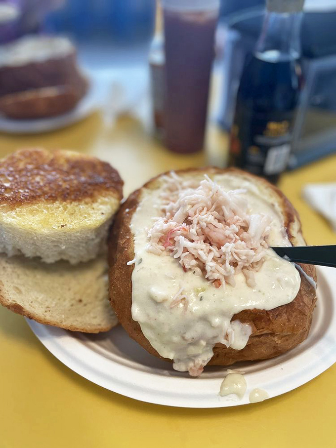 The bread bowl isn't just a vessel; it's an edible treasure chest. Once the chowder's gone, the sourdough finale begins.